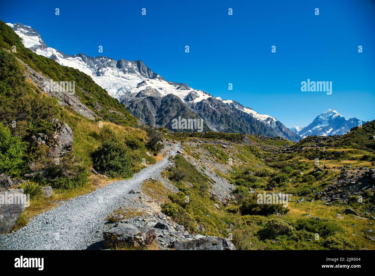 Hiking the track to the Kea Point lookout in the Hooker valley in ...