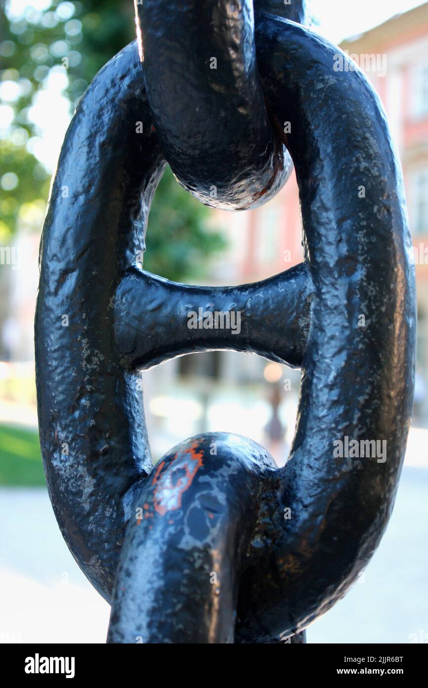 Black and big stretched chain in town Stock Photo - Alamy