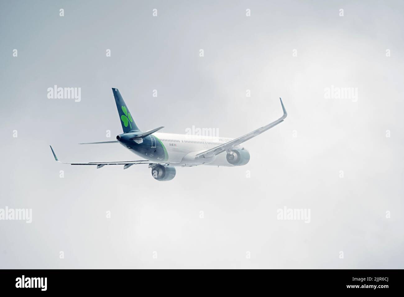 A shot of an Aer Lingus Airbus A320 in flight from the back after ...