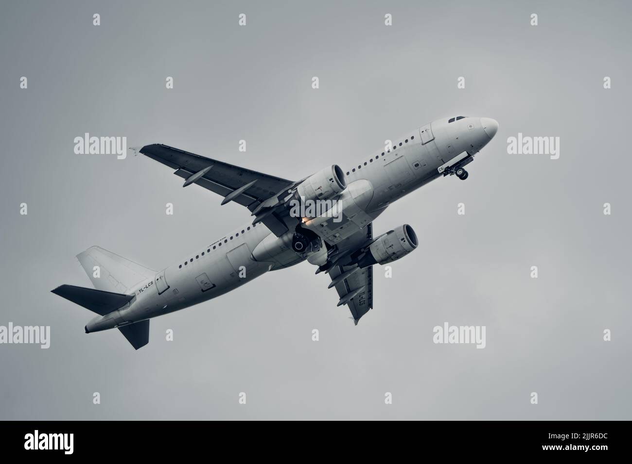 A closeup shot of an Embraer E195 plane in take off from the Dublin ...