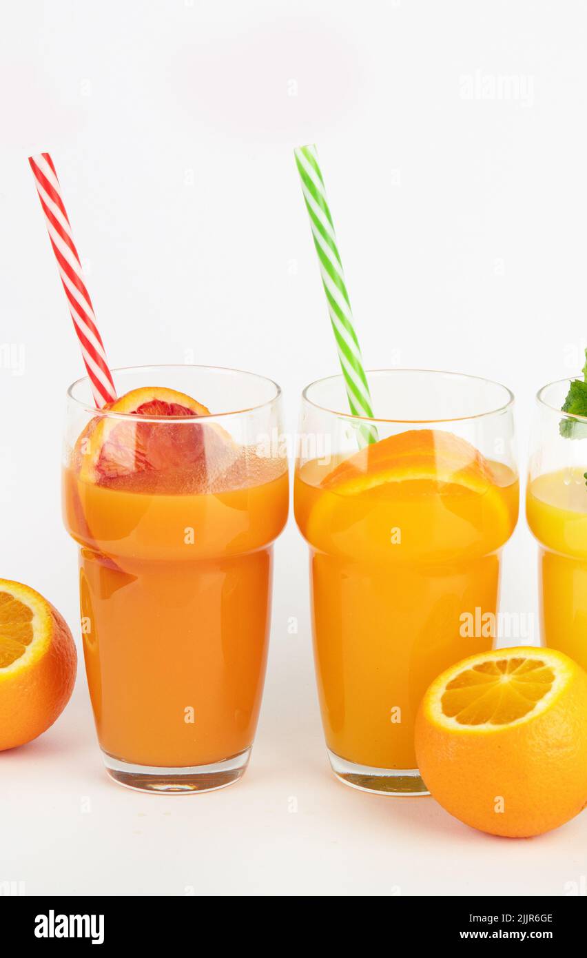 Fruit juices assortment on light background. Freshly made drinks Stock ...