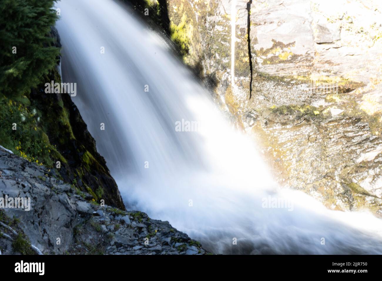 A beautiful landscape of a waterfall in a forest Stock Photo - Alamy