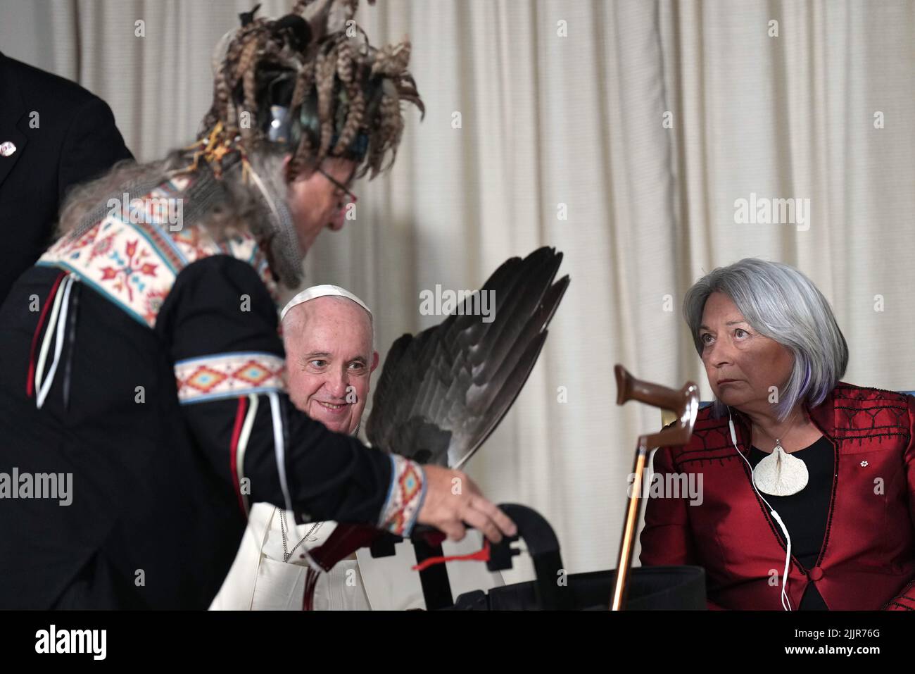 Pope Francis and Gov. Gen. Mary Simon, right, are greeted by Raymond ...
