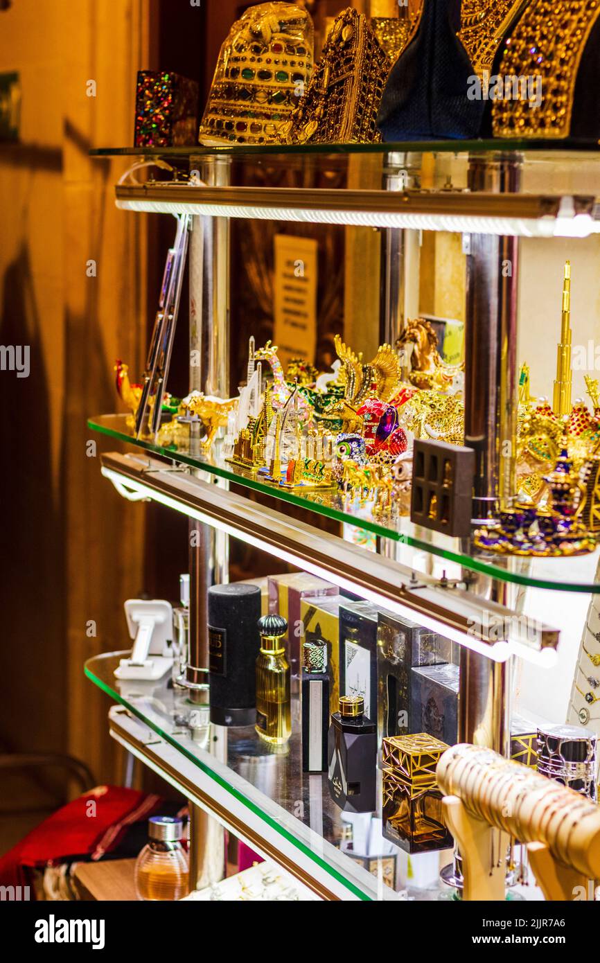 Various souvenirs on the display of a small shop Stock Photo - Alamy