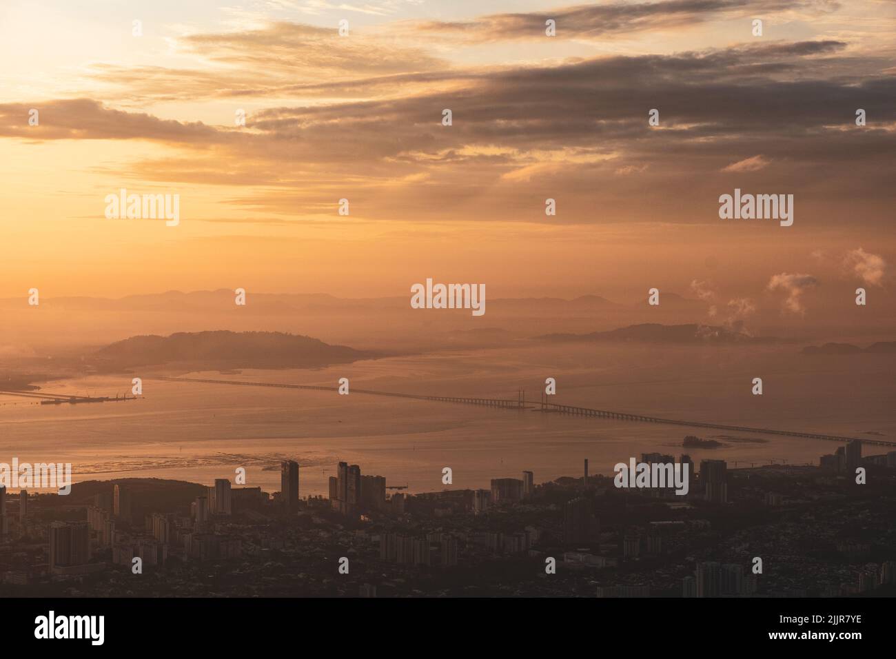 A scenic golden sunset over the sea in Penang Hill Stock Photo - Alamy