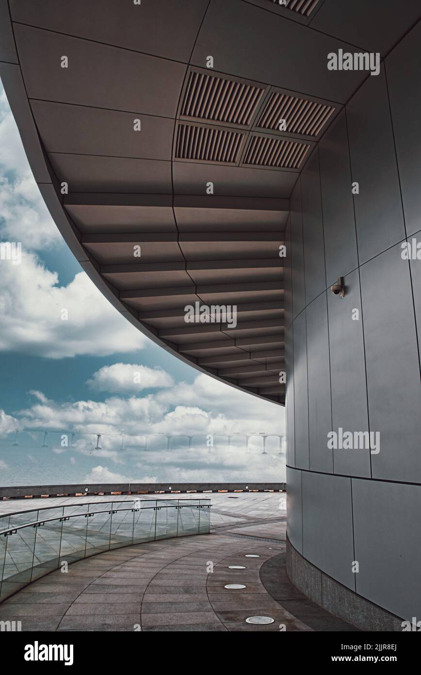 A vertical shot of the walkway at Macau Science Center and a waterfront ...