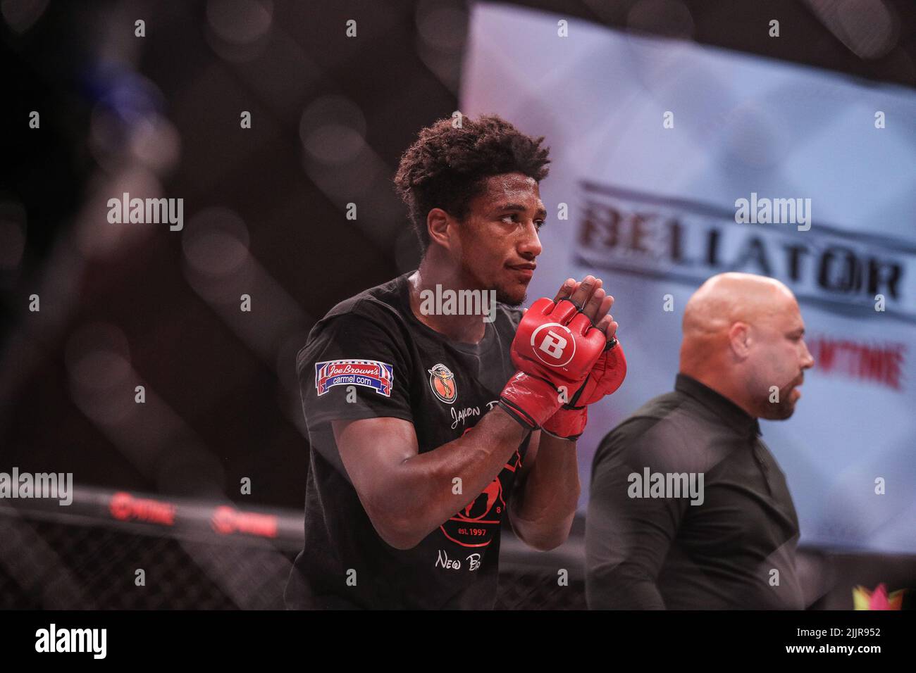 Jaylon Bates reacts to the crowd before having his hand raised in ...