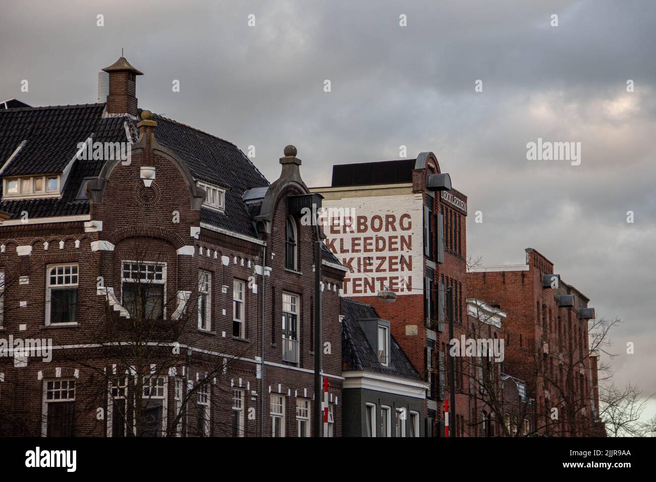 The advertisement painted on the side of an old brick building Stock ...