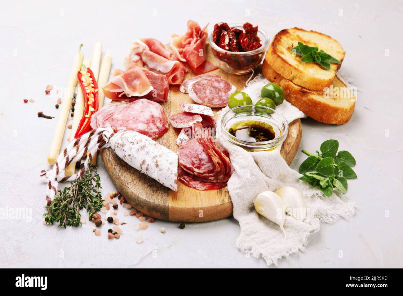 Sausages assortment on light background. Meat product made of finely ...