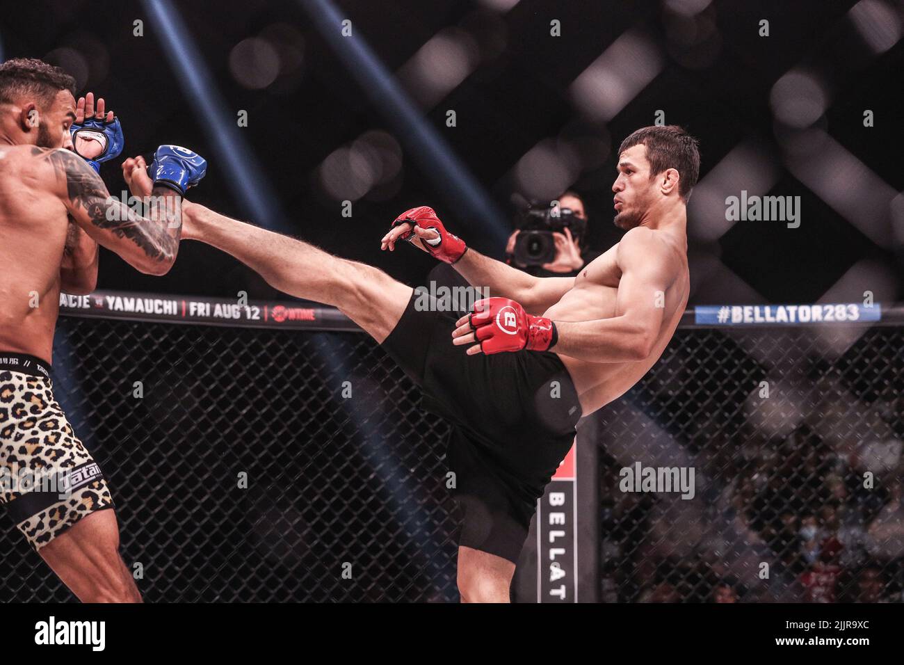 Usman Nurmagomedov throws a head kick against Chris Gonzalez at ...