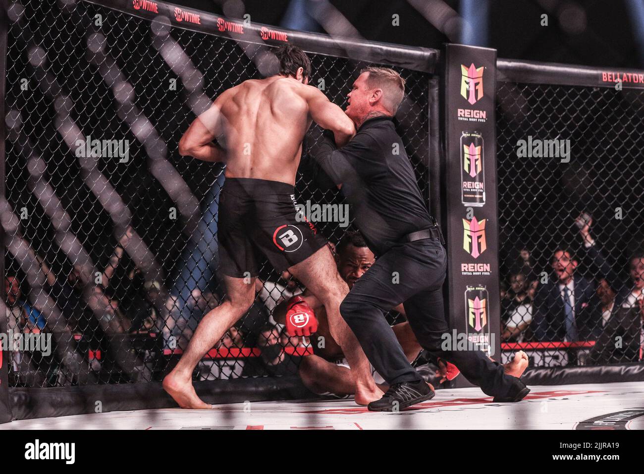 The referee steps in and pulls Tofiq Musayev off of Sidney Outlaw at ...