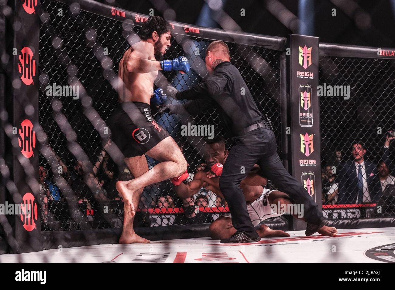 The referee steps in and pulls Tofiq Musayev off of Sidney Outlaw at ...