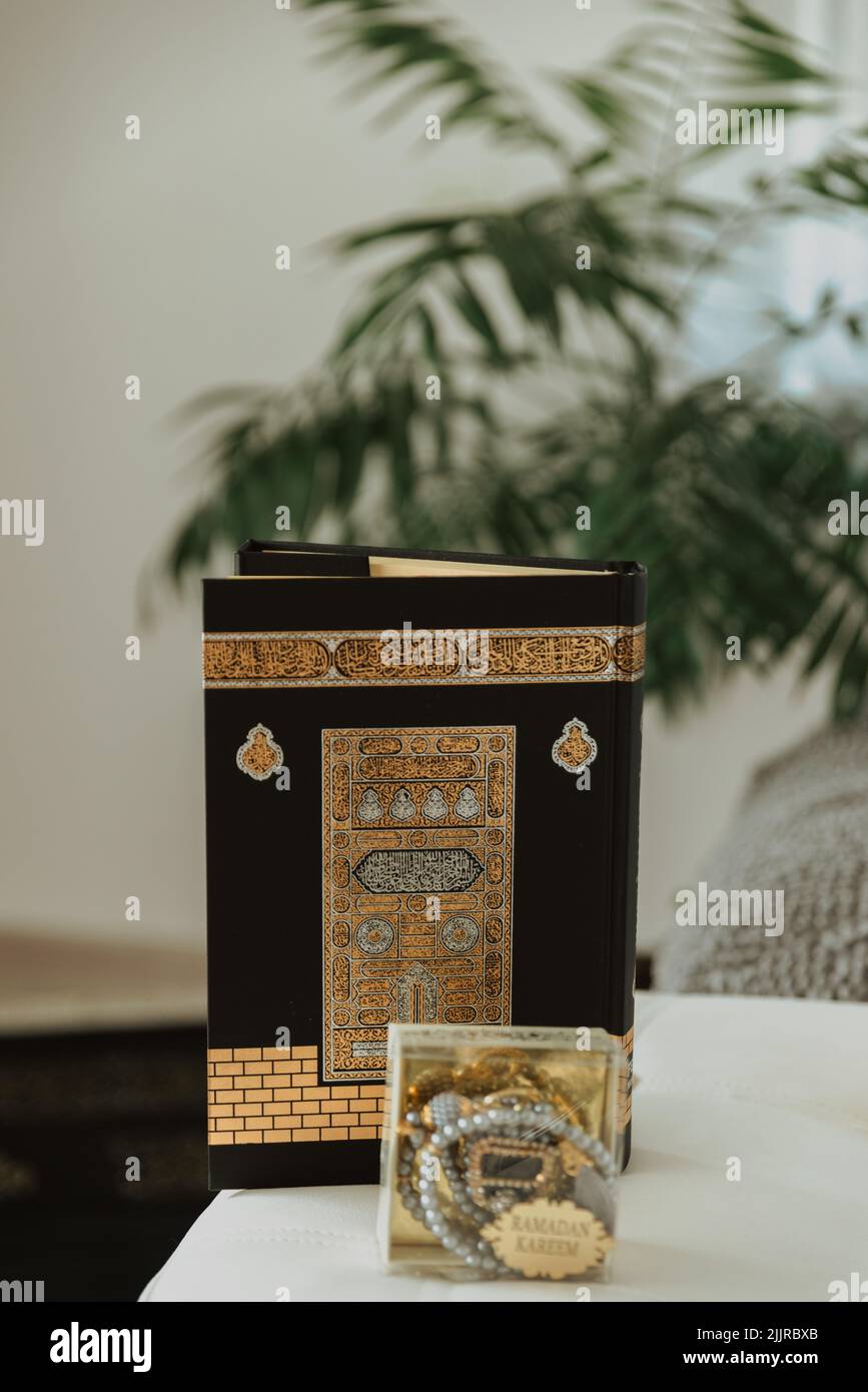 The prayer set-black rug and black velvet Quran, decorated with Kaaba ...