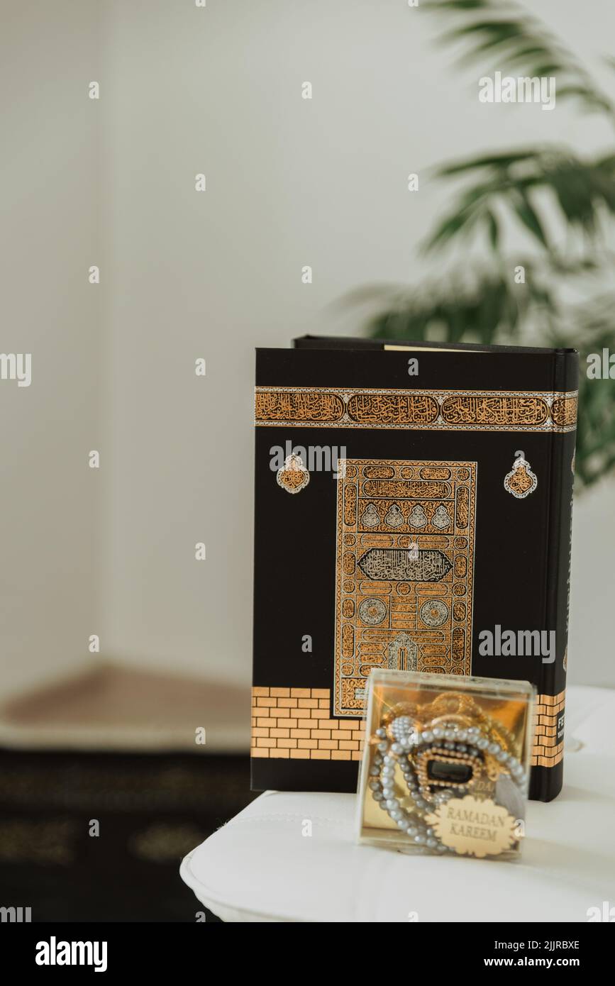 The prayer set-black rug and black velvet Quran, decorated with Kaaba ...