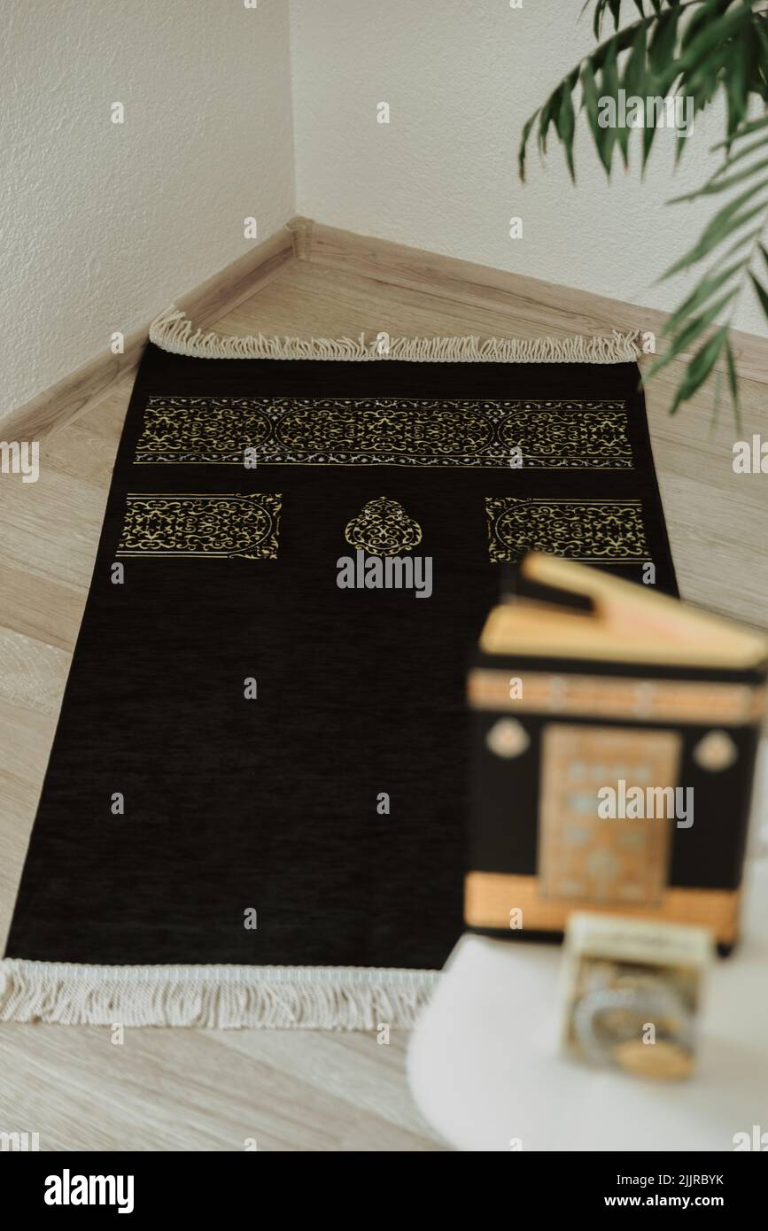 The prayer set-black rug and black velvet Quran, decorated with Kaaba ...