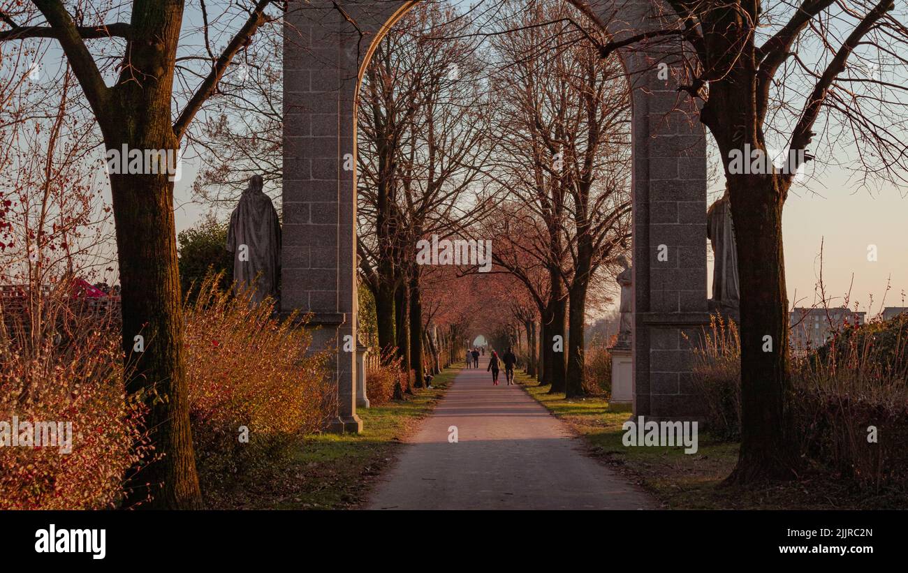 A panoramic view of the stone arched gate with sculptures at entrance ...