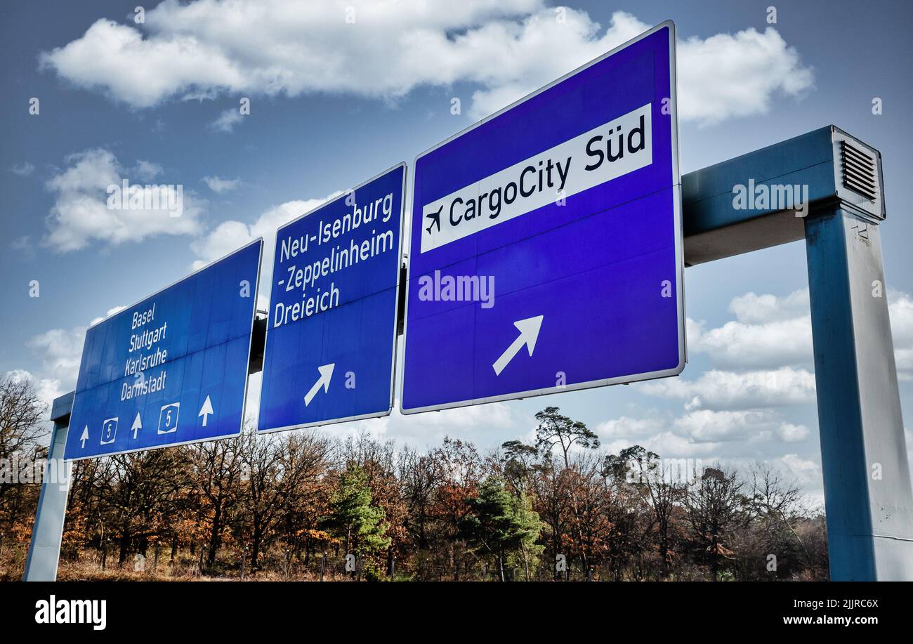 The highway road signs under a blue sky Stock Photo - Alamy