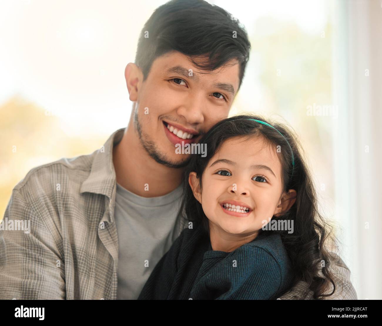 A dad is a daughters first love. a young man bonding with his daughter ...