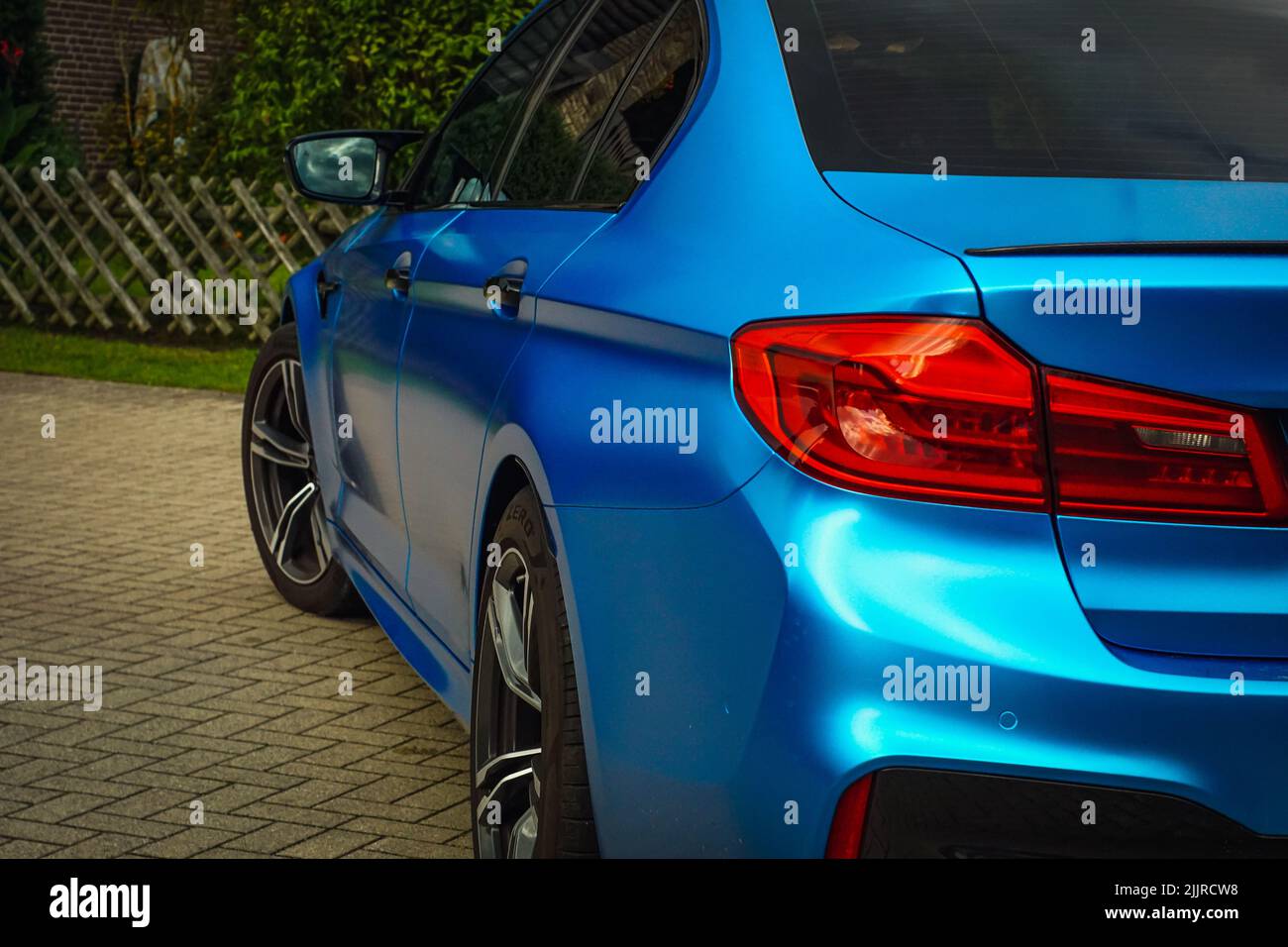 The back of a modern blue car Stock Photo - Alamy