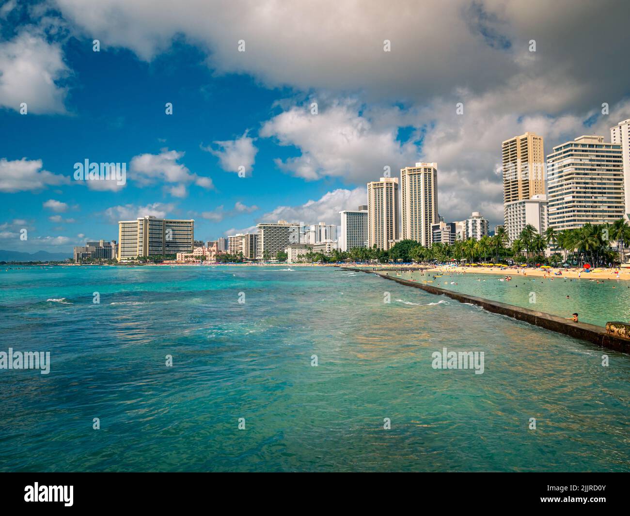 A beautiful view of the modern buildings by the ocean in Waikiki ...
