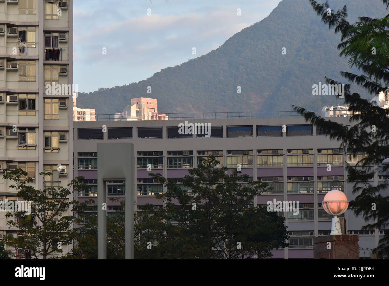 A beautiful view of high-rise buildings in a mountainous landscape ...