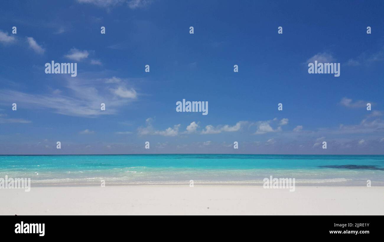 An aerial view of sea with sandy beach in Maldives Stock Photo - Alamy