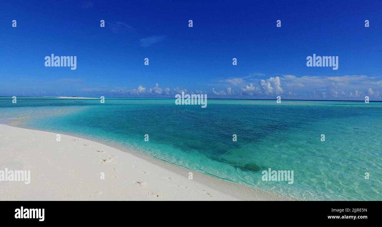 An aerial view of sea with sandy beach in Maldives Stock Photo - Alamy