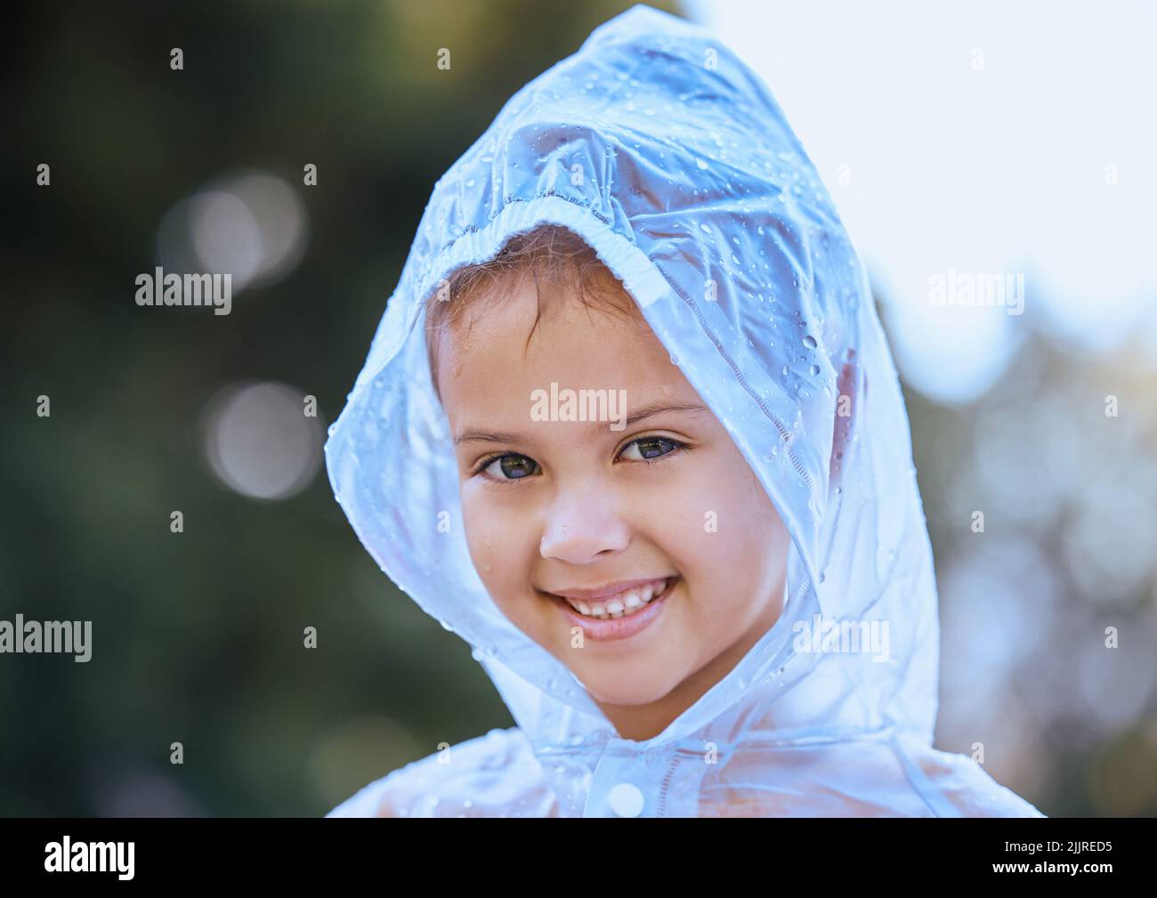 living my best life. a little girl playing in the rain Stock Photo - Alamy