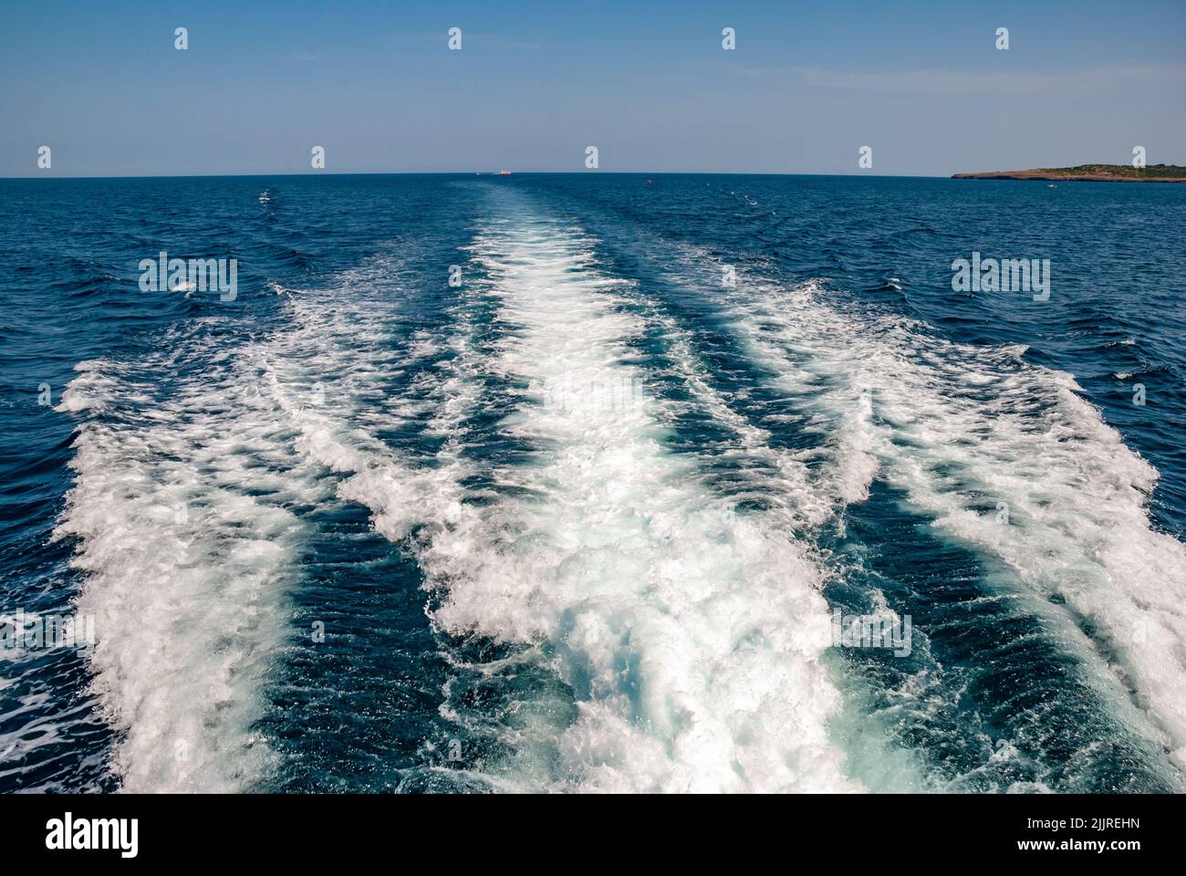 The foaming ocean waves after the boat engine Stock Photo - Alamy