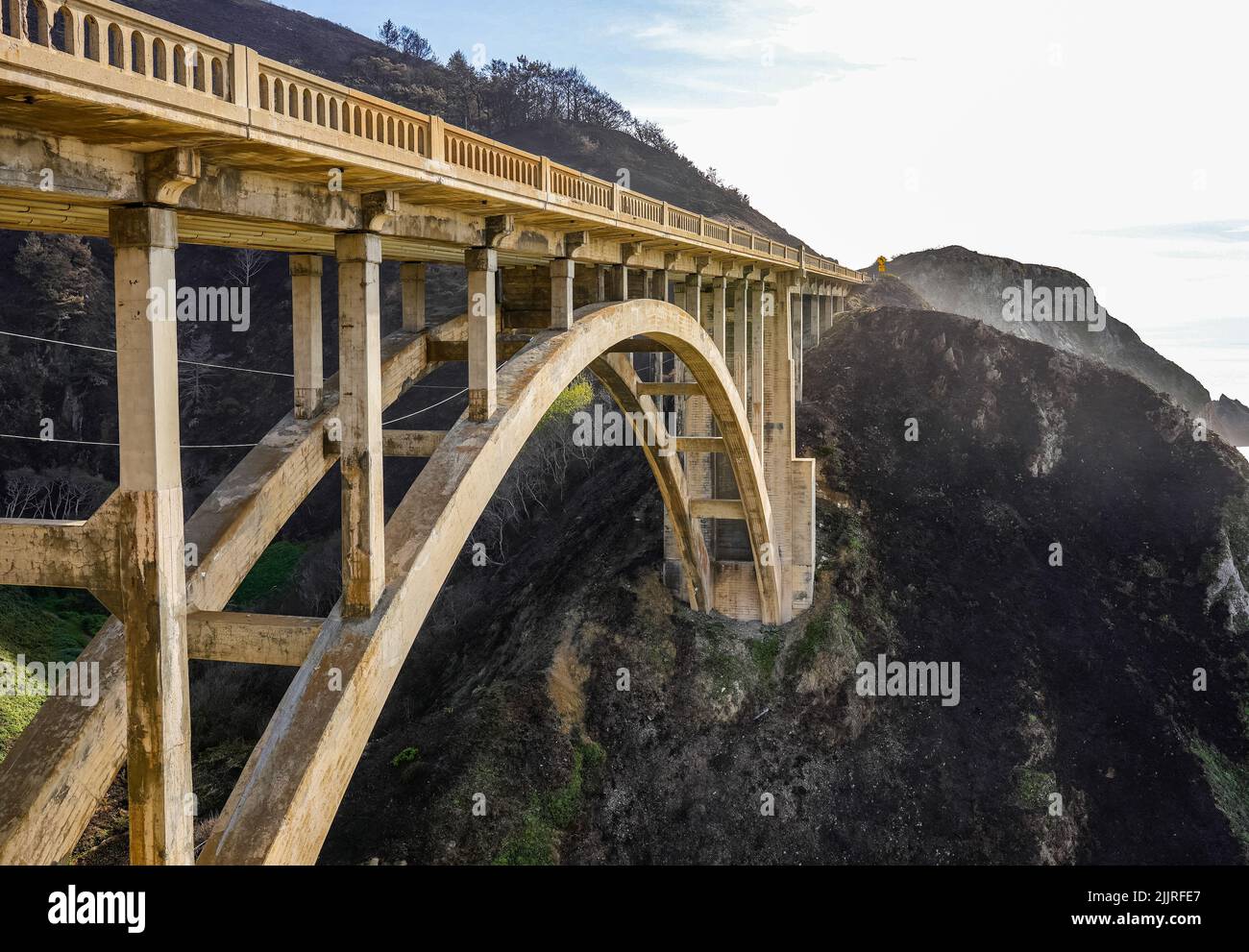 The Rocky Creek bridge in an arch form connecting two side of a ...