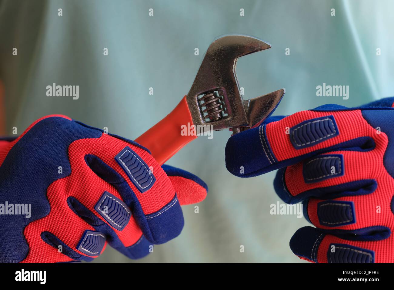 Strong hands mechanic holding hi-res stock photography and images - Alamy
