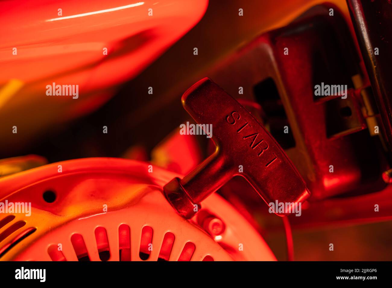 Plastic handle of a manual starter of a gas generator engine with the ...