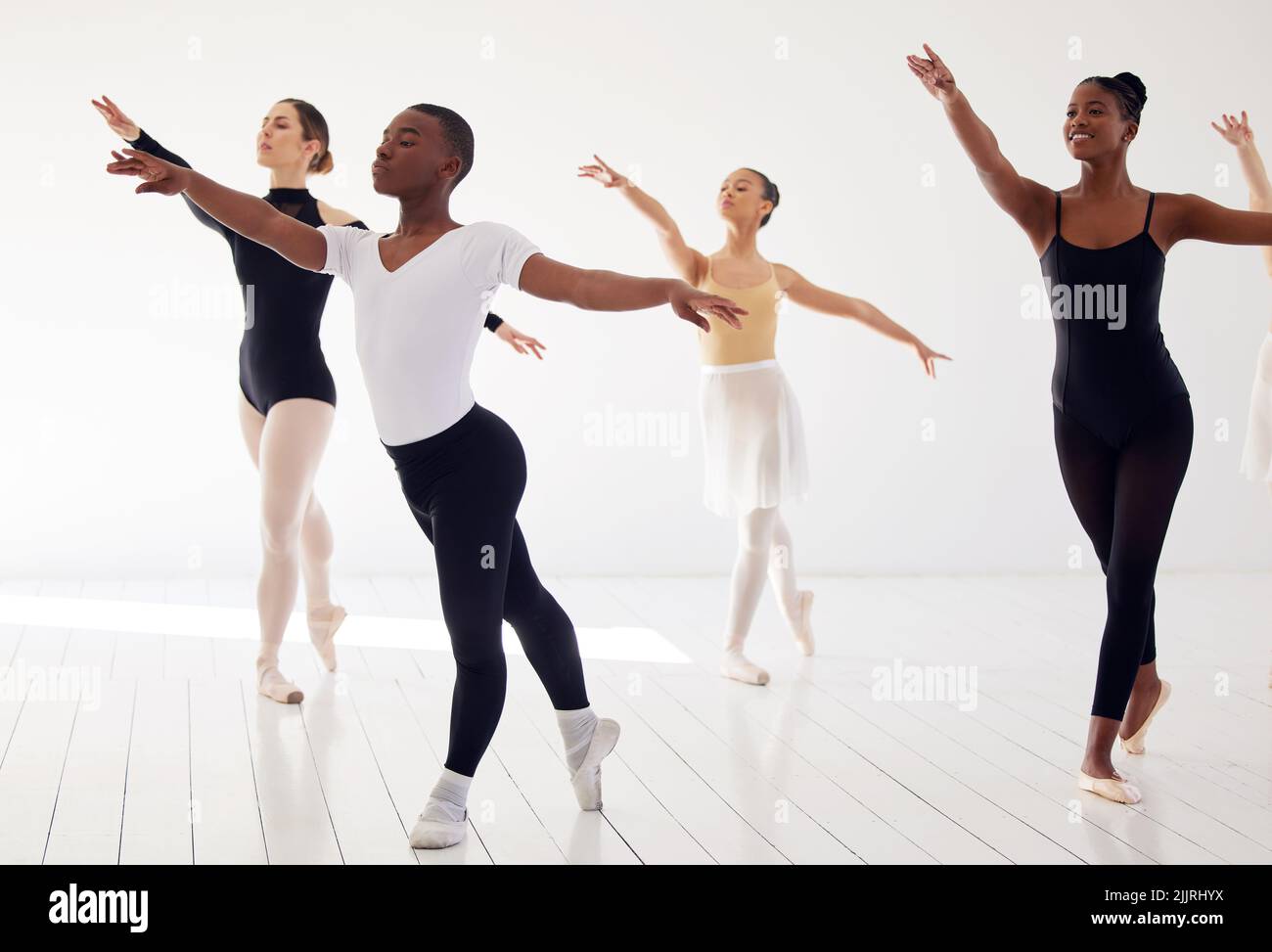 Learning to dance gives you the greatest freedom of all. a group of ...