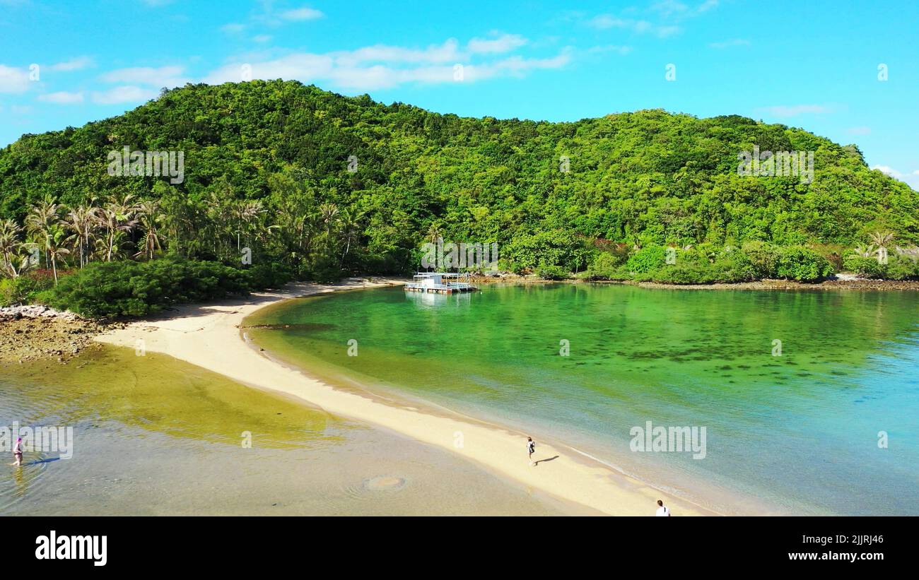 A green hill resort by tranquil water in Koh Ma Island in Ko Pha Ngan ...