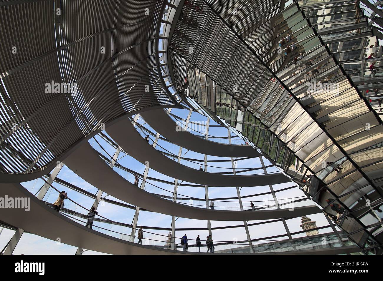 A low angle shot of design inside the dome of the Reichstag building ...