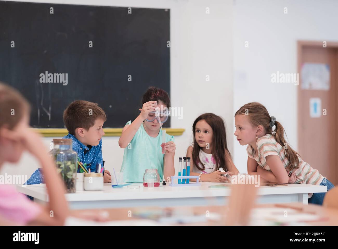 Elementary School Science Classroom: Enthusiastic Teacher Explains ...