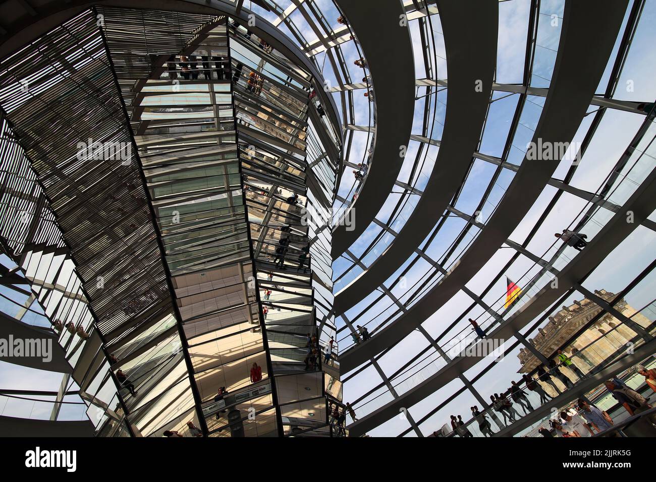 A low angle shot of the glass dome of the German Reichstag building in ...