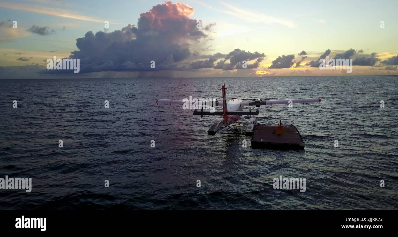 A seaplane landing on the water near the Maldives Stock Photo - Alamy
