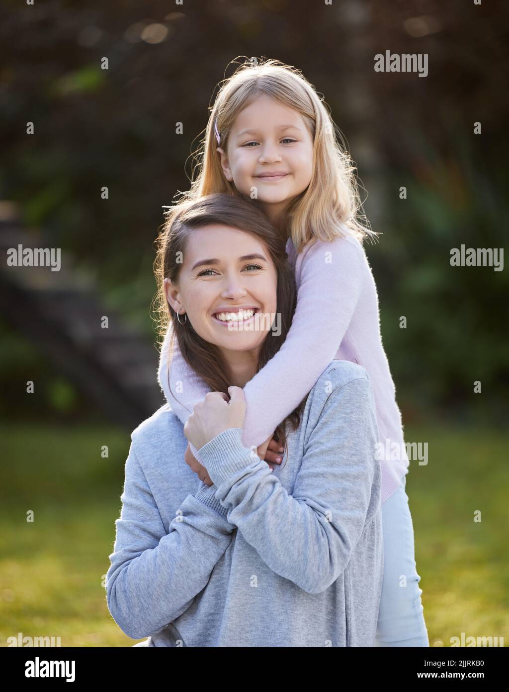 Growing up to be just like mom. Cropped portrait of an attractive young ...
