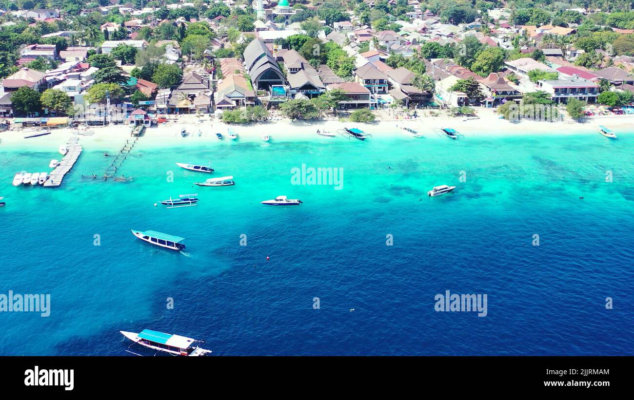 An aerial view of ships around a beach in Gili Trawangan island Stock ...