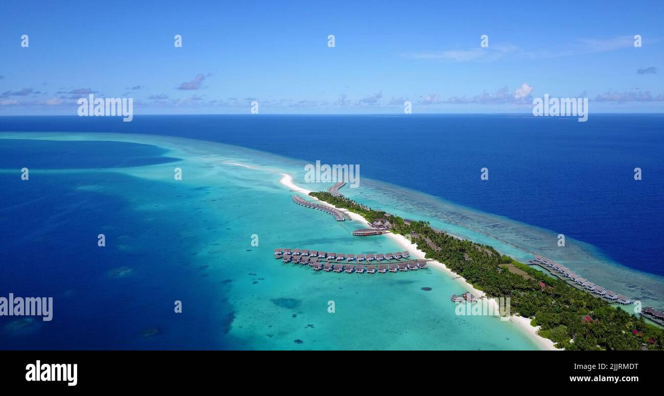 An aerial shot of a narrow tropical island in the azure ocean Stock ...