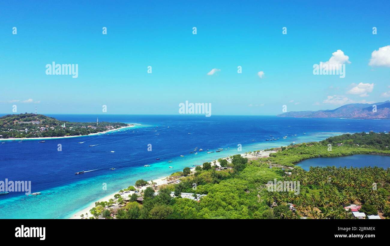 An aerial shot of islands in the azure ocean Stock Photo - Alamy