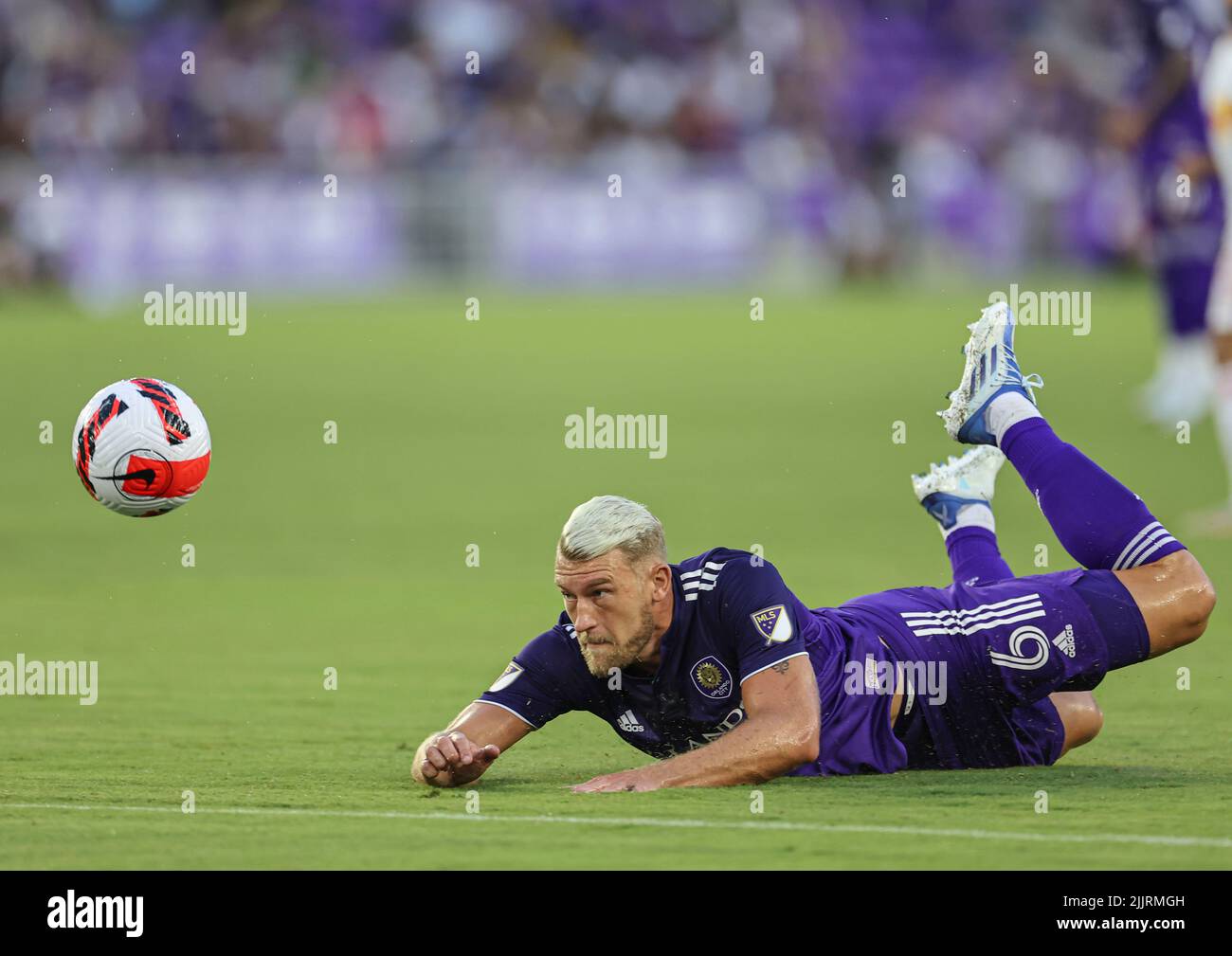 Orlando, FL: Orlando City defender Robin Jansson (6) heads the ball ...