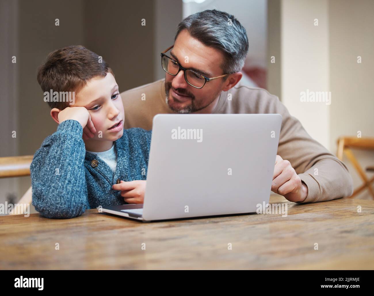 I know its tough but you can do it. a father and son team using a ...