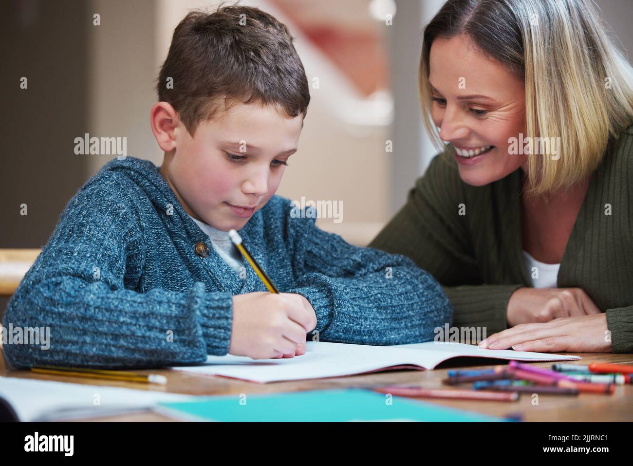 Be a source of support for your children. a woman helping her son with ...