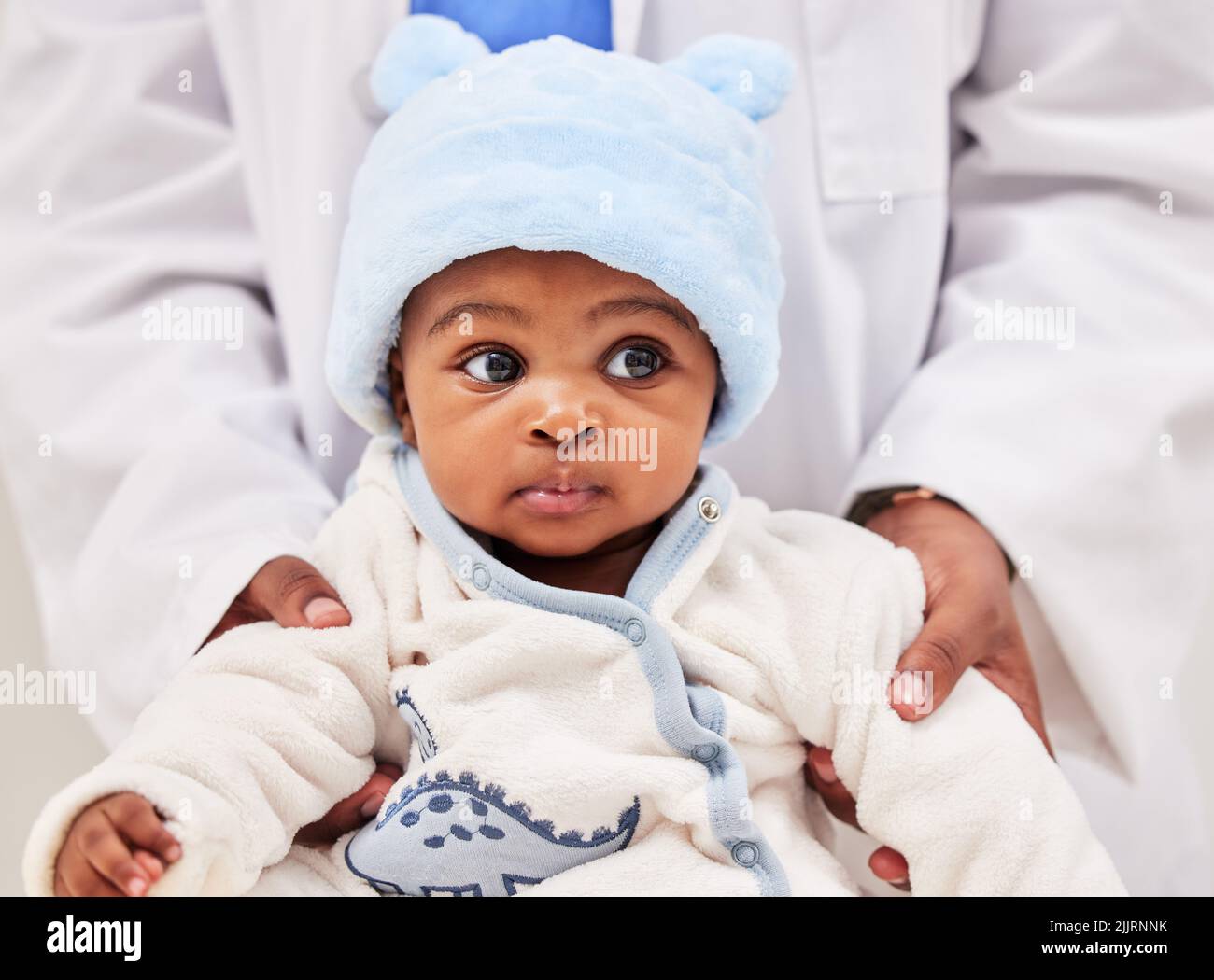 Every child deserves the best heaalthcare. a little baby at a checkup ...