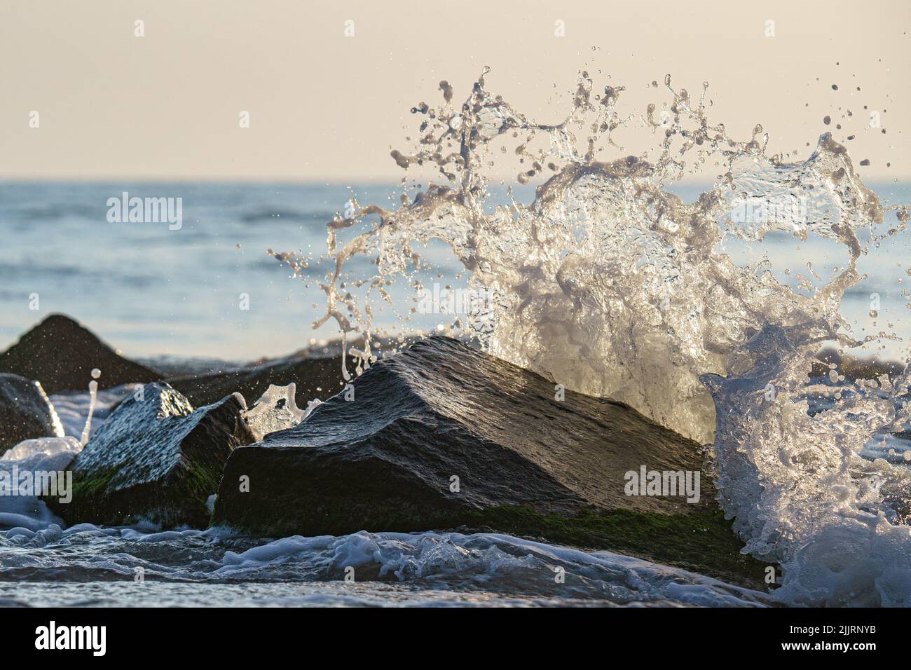 A beautiful shot of a moment of splash made while the water hitting a ...