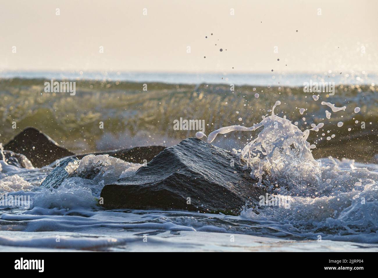 A beautiful shot of a moment of splash made while the water hitting a ...