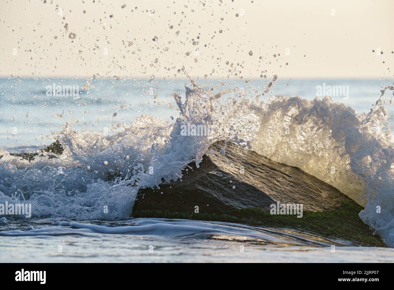 A beautiful shot of a moment of splash made while the water hitting a ...
