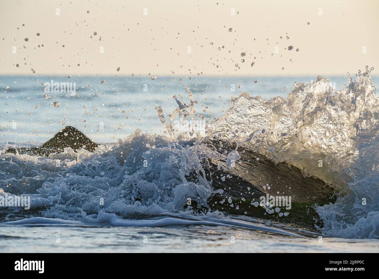A beautiful shot of a moment of splash made while the water hitting a ...